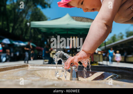 Republic of Armenia. Baby hand and Armenian pulpulak Stock Photo - Alamy