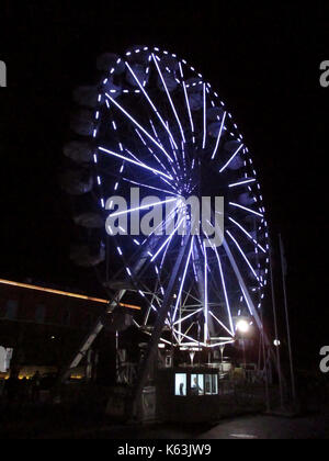 night shot carousel, panoramic wheel, illuminated Stock Photo - Alamy