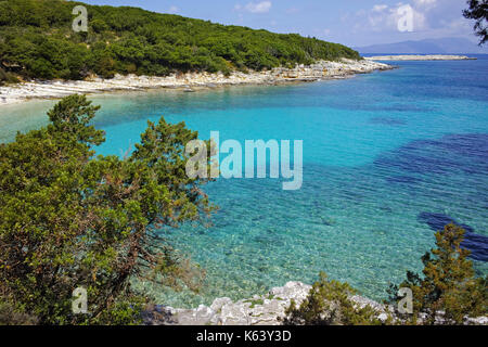Blue waters of Emblisi Fiskardo Beach, Kefalonia, Ionian islands ...