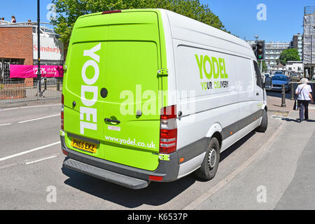 Yodel delivery van parked on a street road Ambleside Cumbria England UK ...