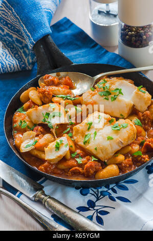Cod and chorizo stew with broad beans Stock Photo - Alamy