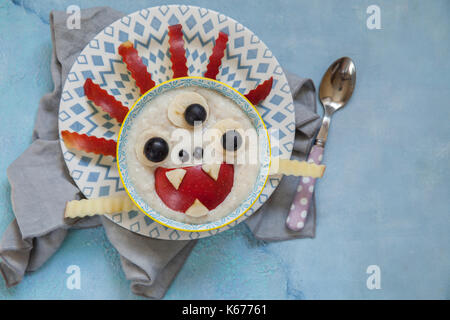 Kids funny monster oatmeal for halloween lunch or breakfast. Three ...