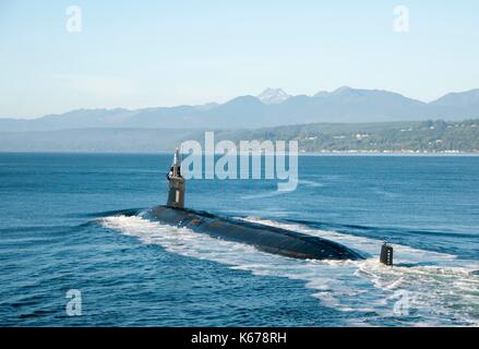 The Seawolf-class fast-attack submarine USS Connecticut (SSN 22) returns to its homeport in ...
