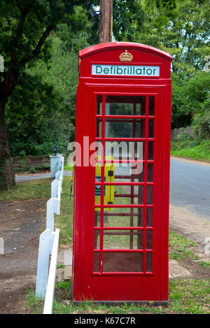 old fashioned red phonebooth in England Stock Photo - Alamy