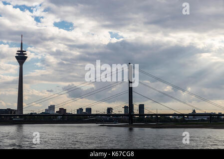 Skyline along the Rhine river with the telecommunications tower and the ...