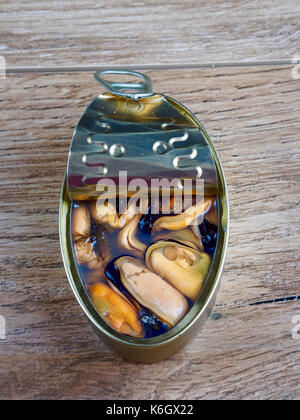 Natural mussels canned on wood background Stock Photo - Alamy