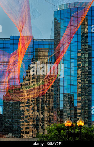 Aerial view of Boston, reflections on Hancock Tower at sunset ...