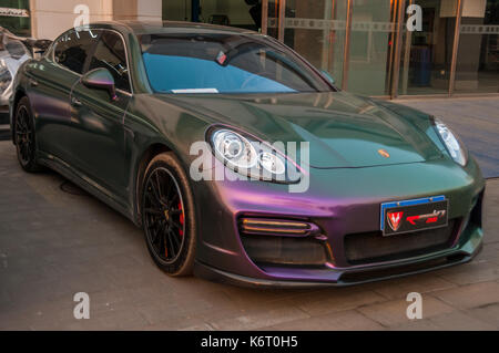 Porsche Panamera with a special purple/green paint which changes colour ...