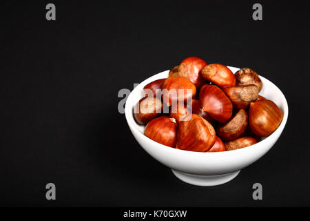 a dish full of chestnuts. autumn food Stock Photo - Alamy