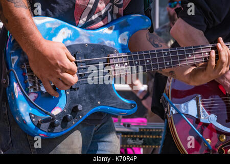 Rock and Roll band guitarist and bass player on stage Stock Photo - Alamy