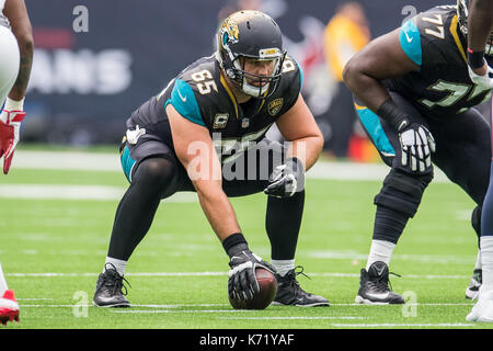Jacksonville Jaguars center Brandon Linder (65) leaves the field after ...