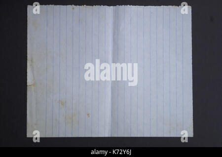 Folded lined paper texture background Stock Photo - Alamy