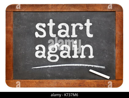 start again sign - white chalk text on a vintage slate blackboard Stock ...
