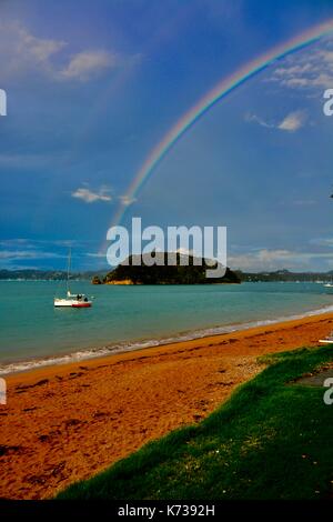 Rainbow over the Baby of Islands Stock Photo - Alamy