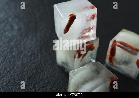 Close-up of flavored ice cubes with spices Stock Photo - Alamy