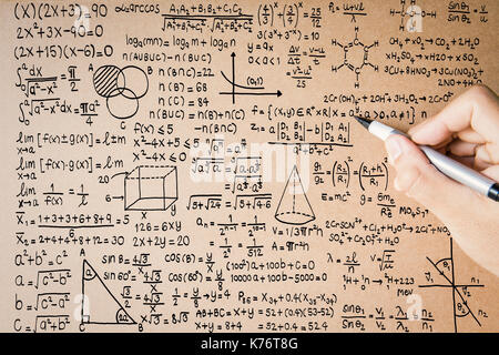 hand writing math formula on glass board Stock Photo - Alamy