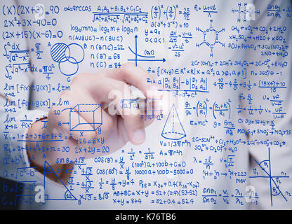 hand writing math formula on brown paper or education background Stock ...