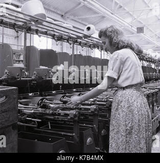 Loom operator. Weaving machine, looms and weaver, Melin Tregwynt, a 200 ...