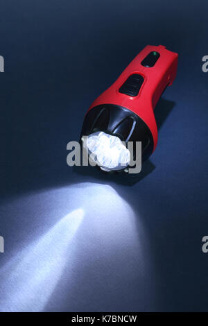 Red metal flashlight Stock Photo - Alamy
