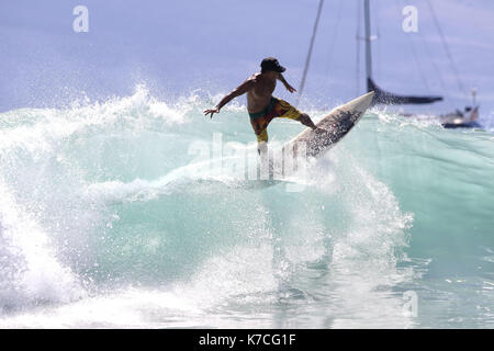 Extreme action surfing at breakwall in Lahaina on Maui Stock Photo - Alamy