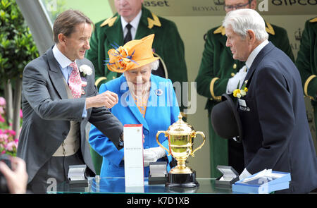 Queen Elizabeth II presents the trophy for the Diamond Jubilee Stakes ...