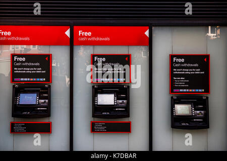 Cash machines machine ATM cash dispenser dispensing visa money UK ...