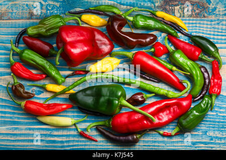 Colorful chile peppers mix. Different shapes and colors, top view Stock ...