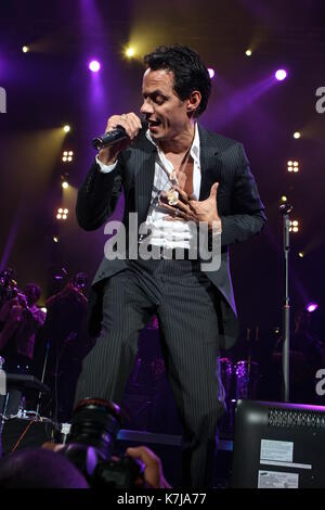 Marc Anthony performing at the Juntos en Concierto with Aventura and ...