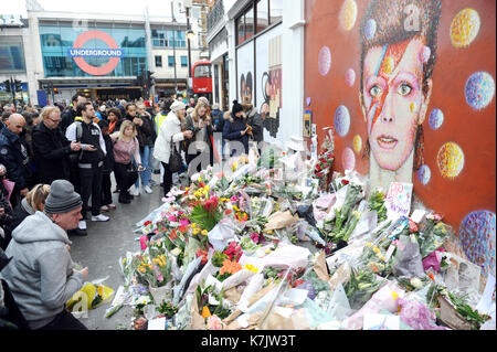 Messages written by fans at a mural of David Bowie in Brixton, on what ...