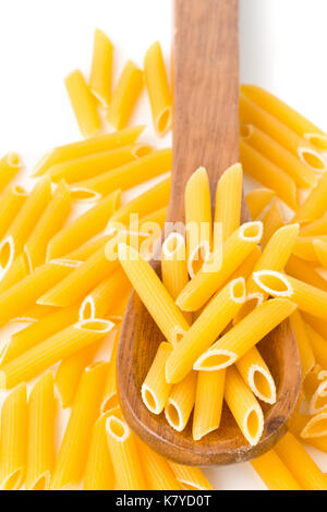 Raw penne for pasta over the wooden background Stock Photo - Alamy