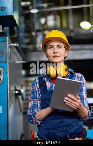 Focused Professional Female Engineer Working on Electronic Circuit ...