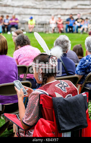 Canadian Ojibwe First Nations woman wears her traditional regalia and ...