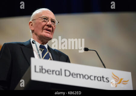 Sir Menzies (Ming) Campbell (Lib Dem) on his phone outside parliament ...