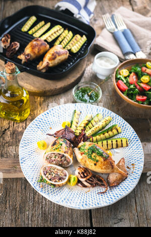 Stuffed squid with buckwheat Stock Photo - Alamy