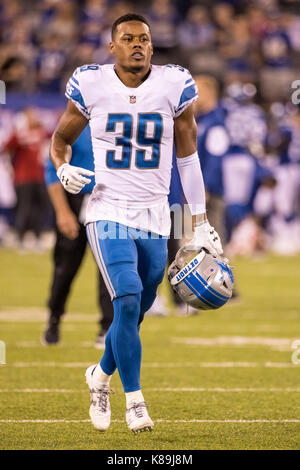 Detroit Lions cornerback Jamal Agnew runs a punt return back for a 64 ...