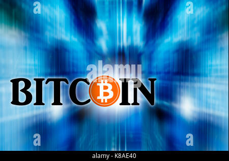 Bitcoin cryptocurrency and blockchain technology concept on blurred ...