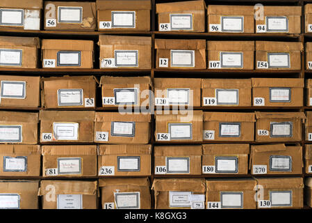 old cardboard boxes fill shelves Stock Photo - Alamy