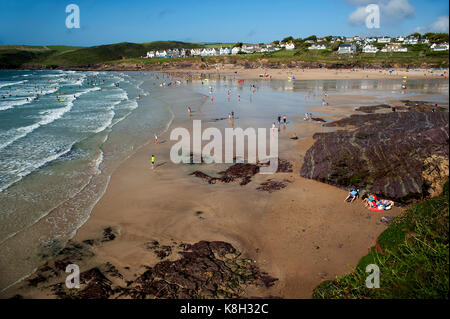 Summer day on the beach at Polzeath in North Cornwall, UK. Taken on ...