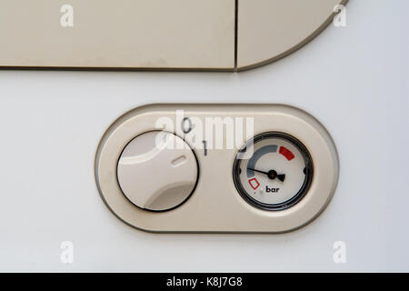 Temperature control dial for central heating at home Stock Photo - Alamy
