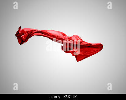Smooth elegant transparent red cloth separated on gray background Stock ...