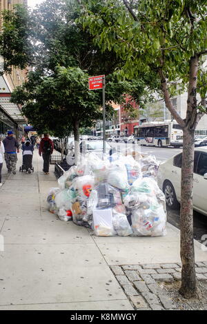 Garbage piled up on the street on Broadway near 34th St. in New York ...