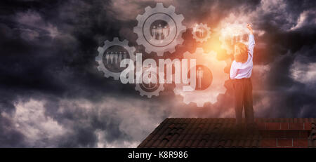 Cute pupil writing against gloomy sky Stock Photo - Alamy
