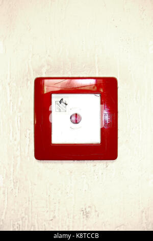 Red emergency stop button on control panel for stopping a machine in ...