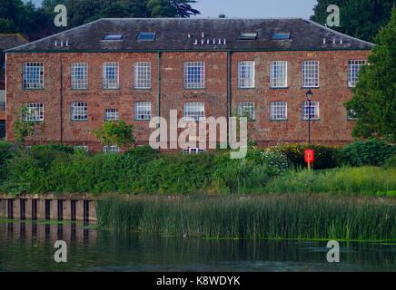old water mill converted into a house with well planted garden Stock ...