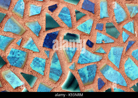 Wall with broken ceramic plates colored fragments Stock Photo - Alamy