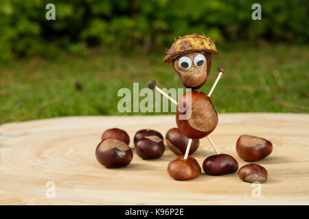 Funny chestnut man made of chestnuts and Steichhälzern in autumn Stock ...