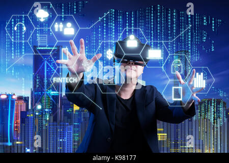 Man touching an online marketing concept on a touch screen with his ...