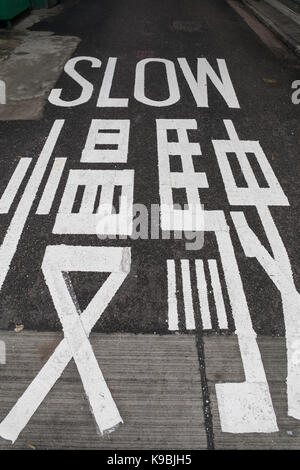 Bilingual road sign written in English and Irish Gaeilge language ...