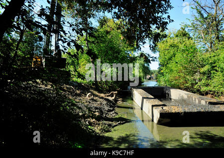 Dredging equipment clearing bottom silt out of river channel Stock ...