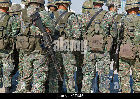 Rear view of the Armed Forces of the Philippines, AFP, dressed in ...